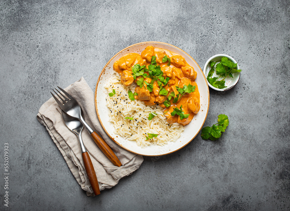 Traditional Indian dish chicken curry with basmati rice and fresh ...