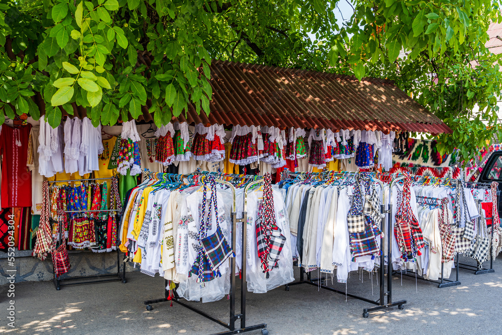 Outdoor street market with traditional Romanian clothing in Sapanta ...