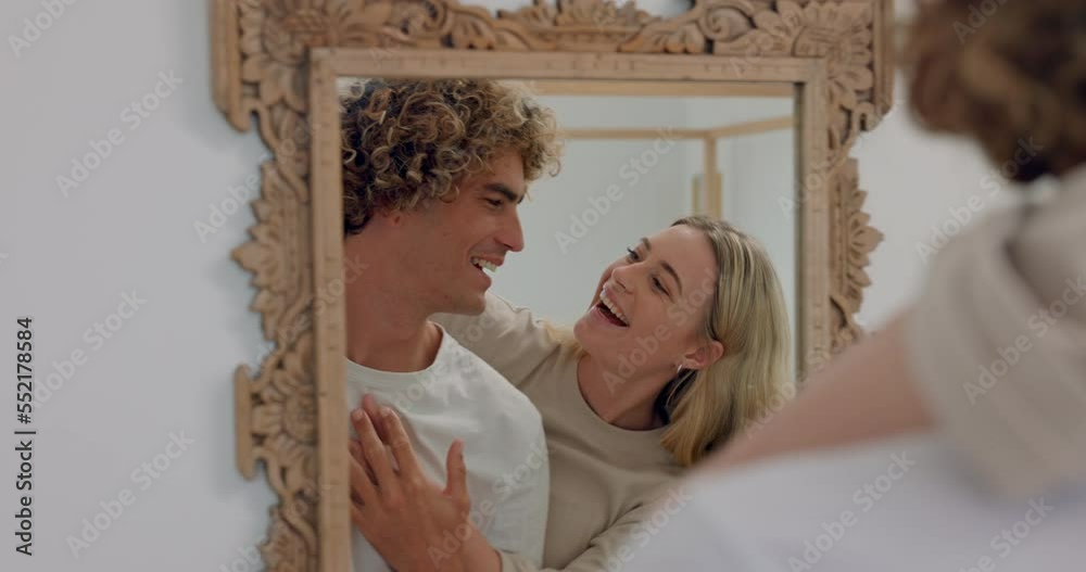 Mirror, love and kiss with a couple talking while looking at their reflection together in the ...