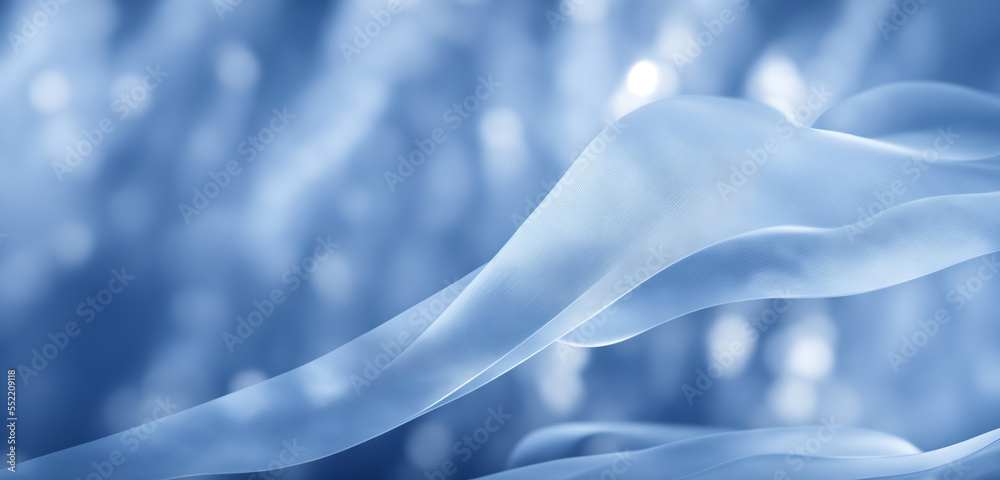 A blue ribbon, fabric background, vibrant fabric that appears to be ...