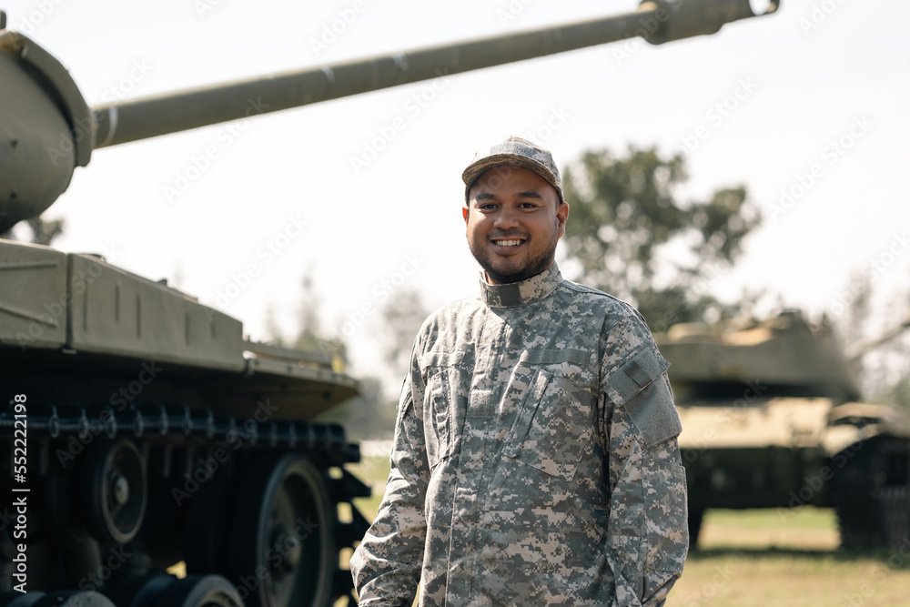Asian man special forces soldier standing against on the field Mission ...