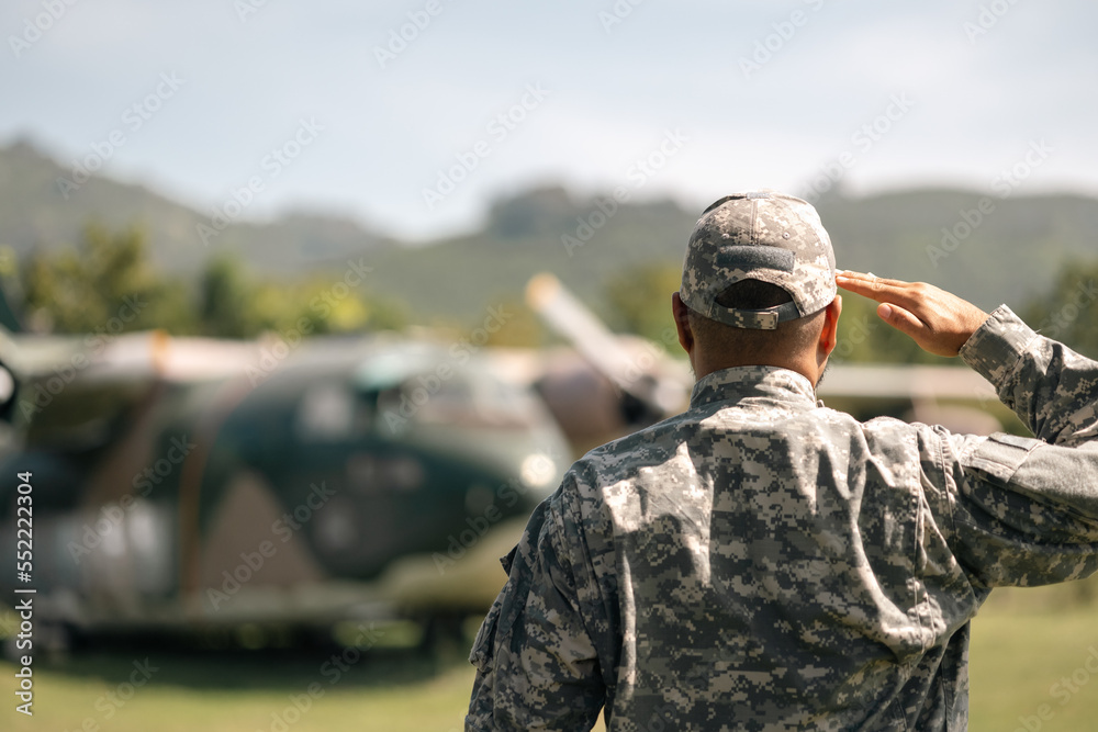 Asian man special forces soldier standing against on the field Mission ...