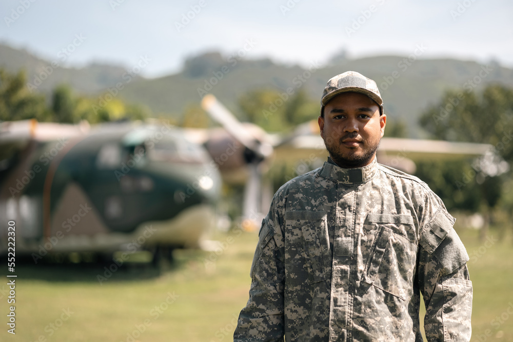 Asian man special forces soldier standing against on the field Mission ...