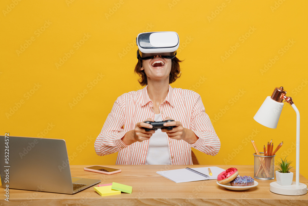 Young fun employee business woman wear shirt sit work at office desk ...