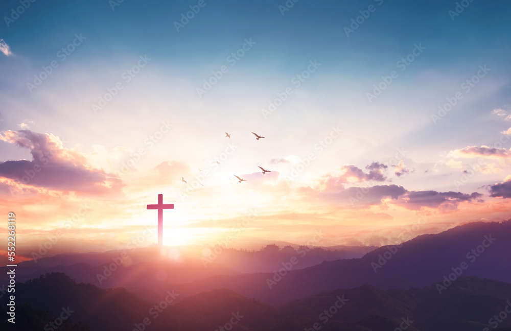 Christian wooden cross on sunset background. Stock Photo | Adobe Stock