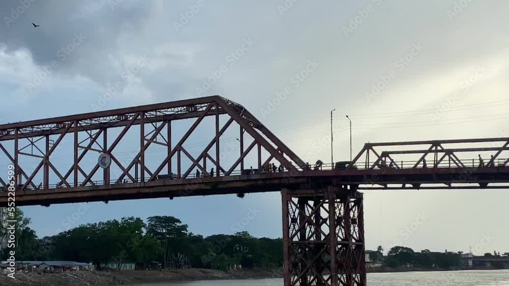 Sylhet rickshaw foot traffic crossing Keane Bridge to Surma River bank ...