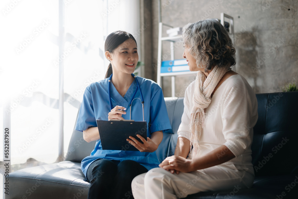 medical doctor holing patient's hands and comforting her.Kind doctor ...