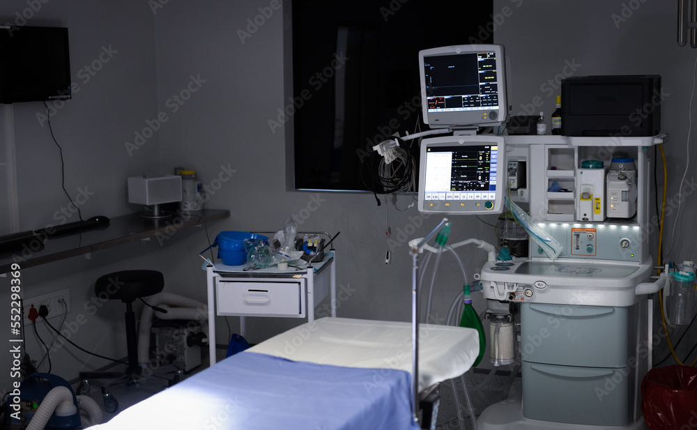 Electronic medical equipment with monitor screens on and empty ...