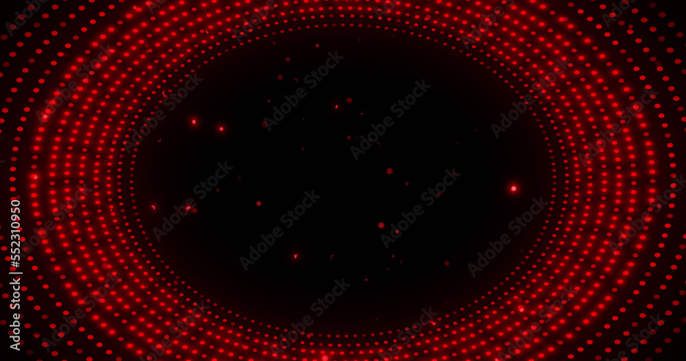 Image of glowing red spots in circular movement on black background ...