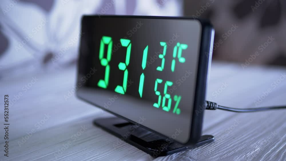 Digital Clock Showing Time on Green Display 9:31 AM, Temperature, Air ...