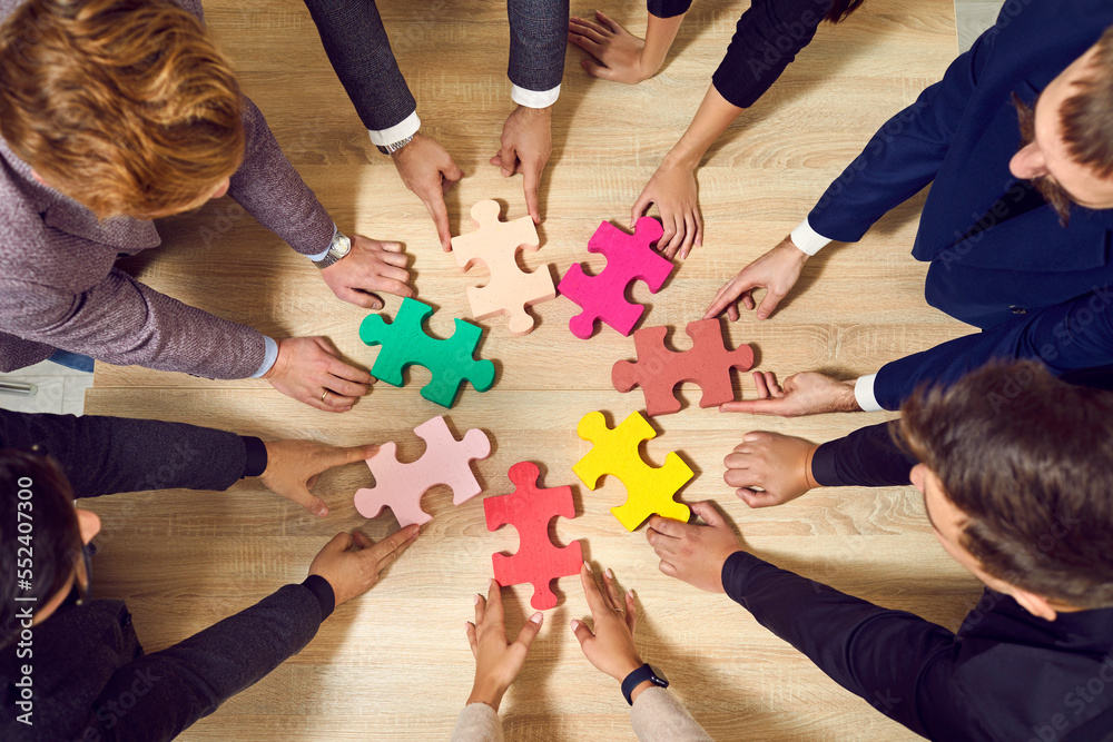 Every contribution adds up. Colored puzzle pieces that business people ...