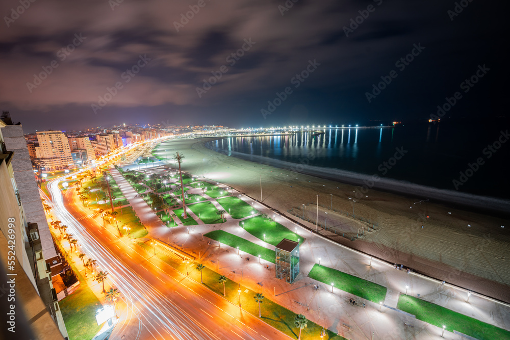 Panoramic view over the buildings downtown Tanger at night in Morocco ...