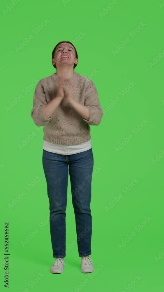 Vertical video: Front view of cheerful woman saying congratulations and ...