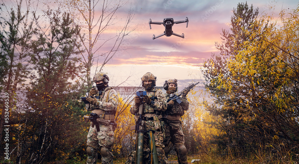 Military soldier controls drone for reconnaissance operation of enemy ...
