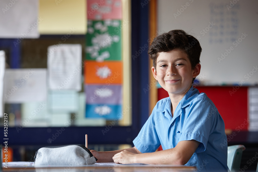 Primary school student in classroom Stock Photo | Adobe Stock