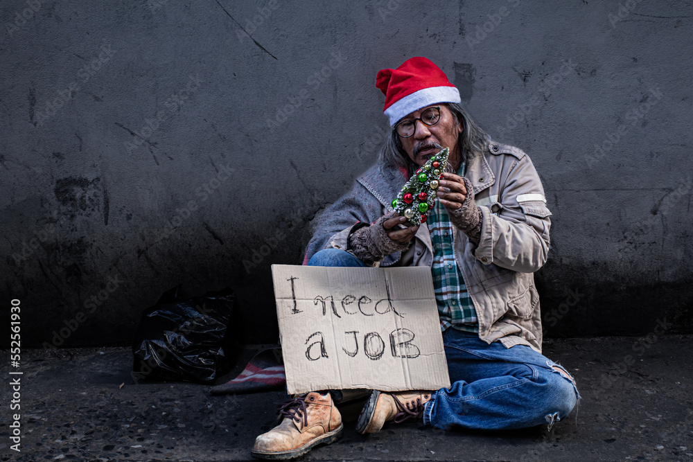 Asian Homeless Person With Sign
