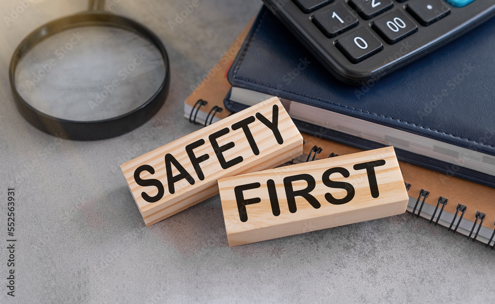 On a light background, wooden cubes and a wooden block with the text ...