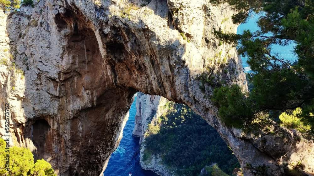 Video „Arco Naturale, limestone arch that forms a bridge between two ...
