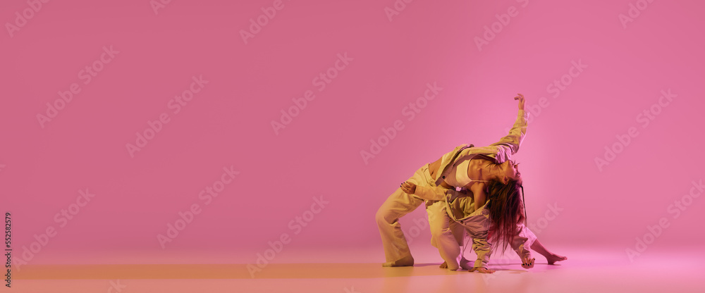 Modern dance art. Young girls, couple of dancers in sports style ...