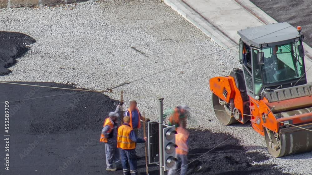 Asphalt paver, roller and truck from above. Construction site of avenue ...