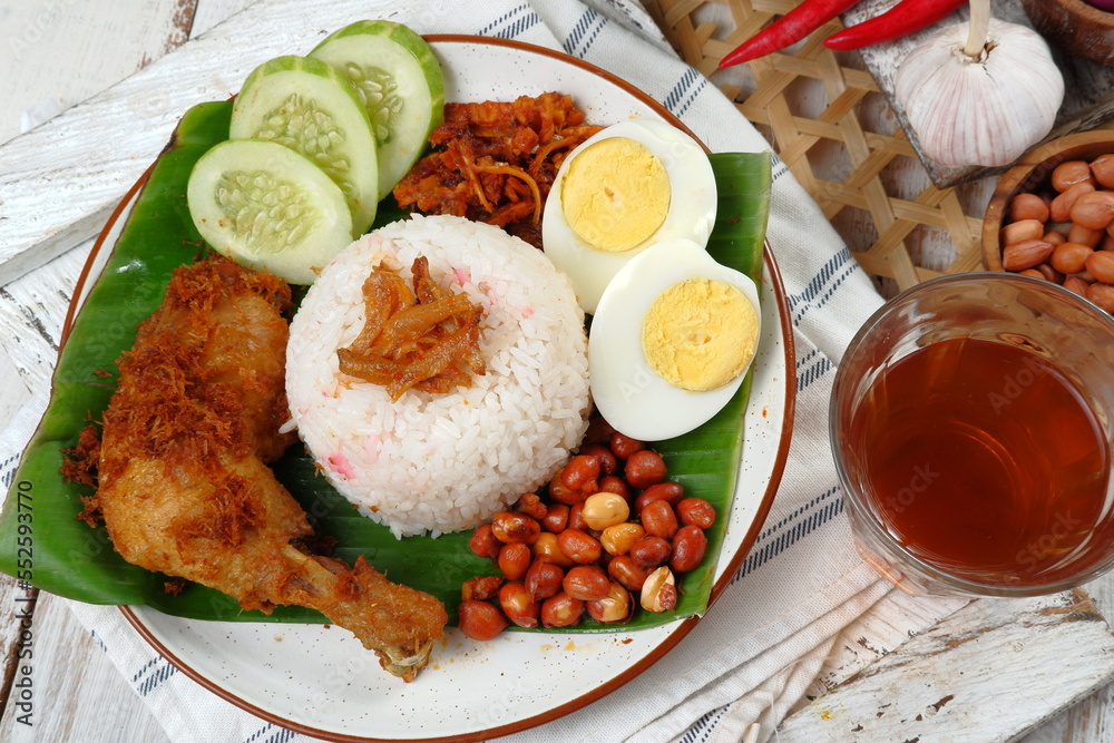 Nasi lemak -Malay fragrant rice dish cooked in coconut milk and pandan ...