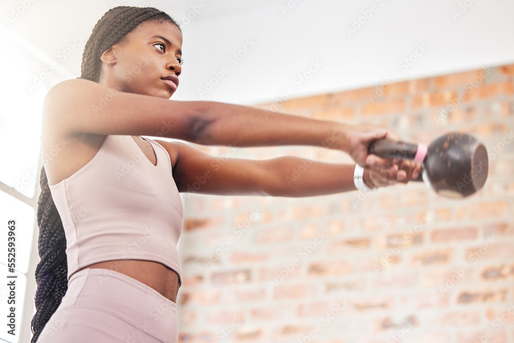 Fitness, kettlebell weight and black woman doing a workout with ...