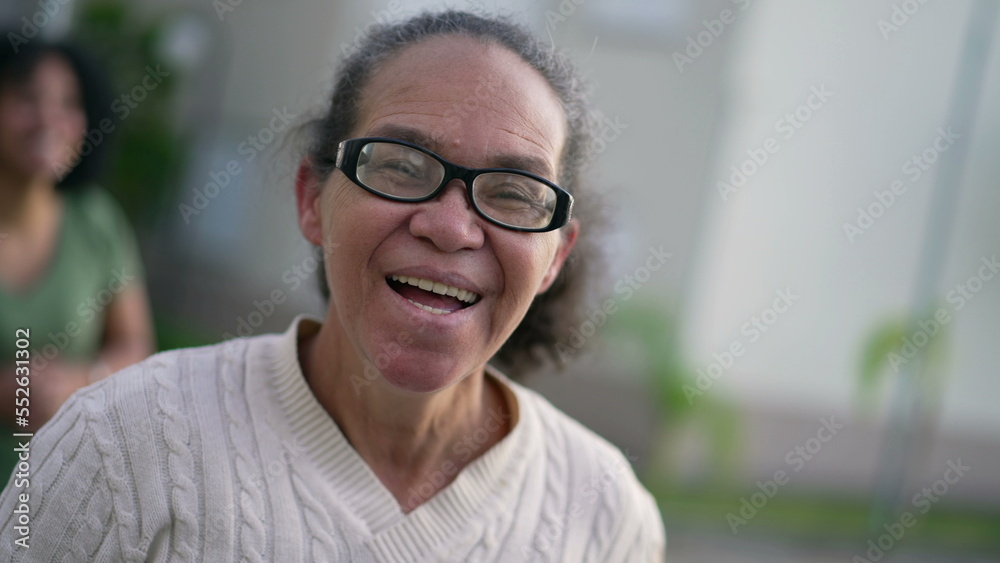One happy senior woman laughing and smiling. South American hispanic ...