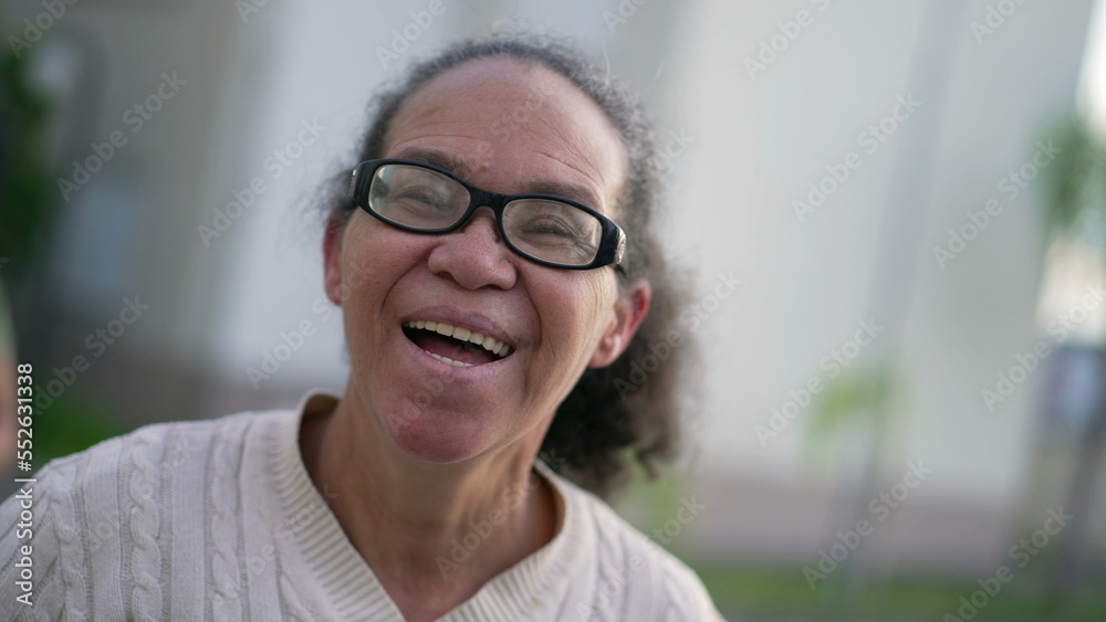 One happy senior woman laughing and smiling. South American hispanic ...