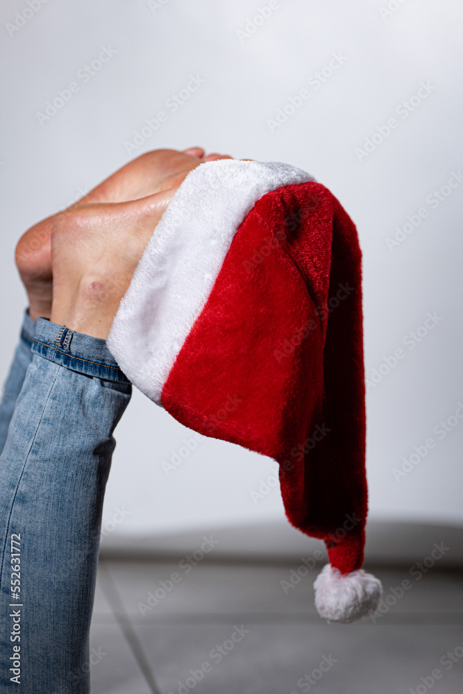 sexy woman feet with a red santa claus hat on. Merry christmas Stock ...