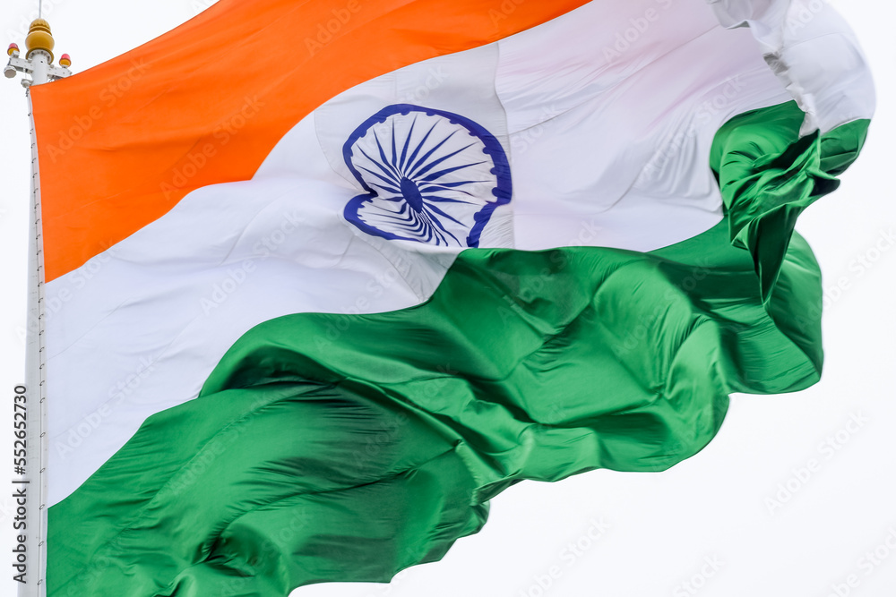 India flag flying high at Connaught Place with pride in blue sky, India ...