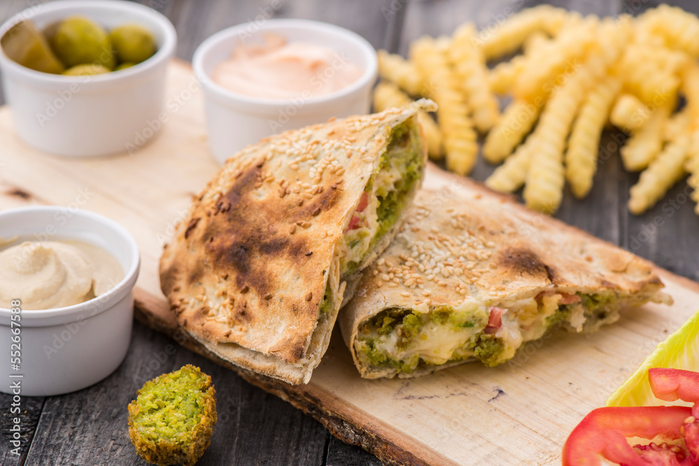 Falafel Pie wrap Meal with fries and dip served in dish isolated on ...