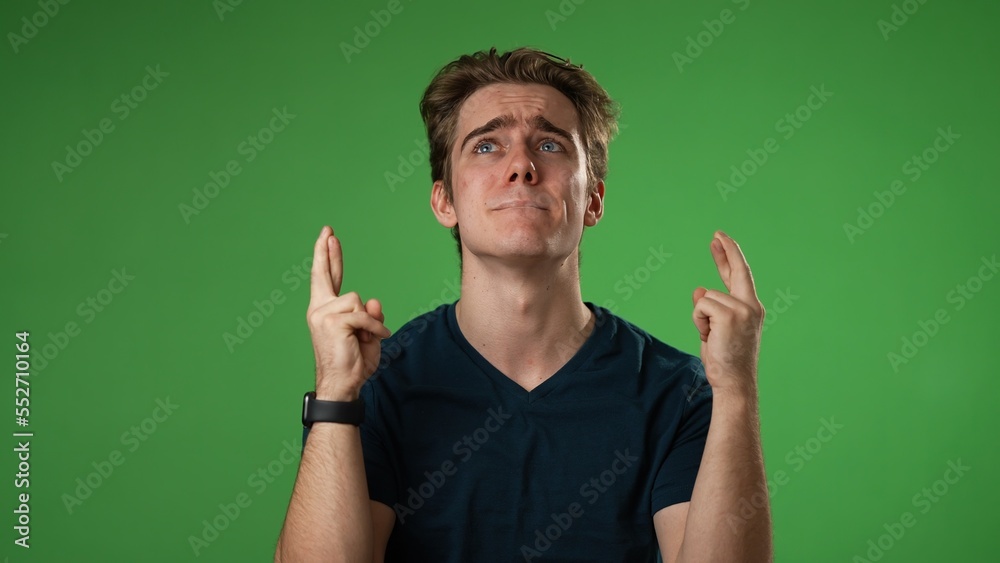 Young worried pleading man 20s hold hands folded in prayer begging ...