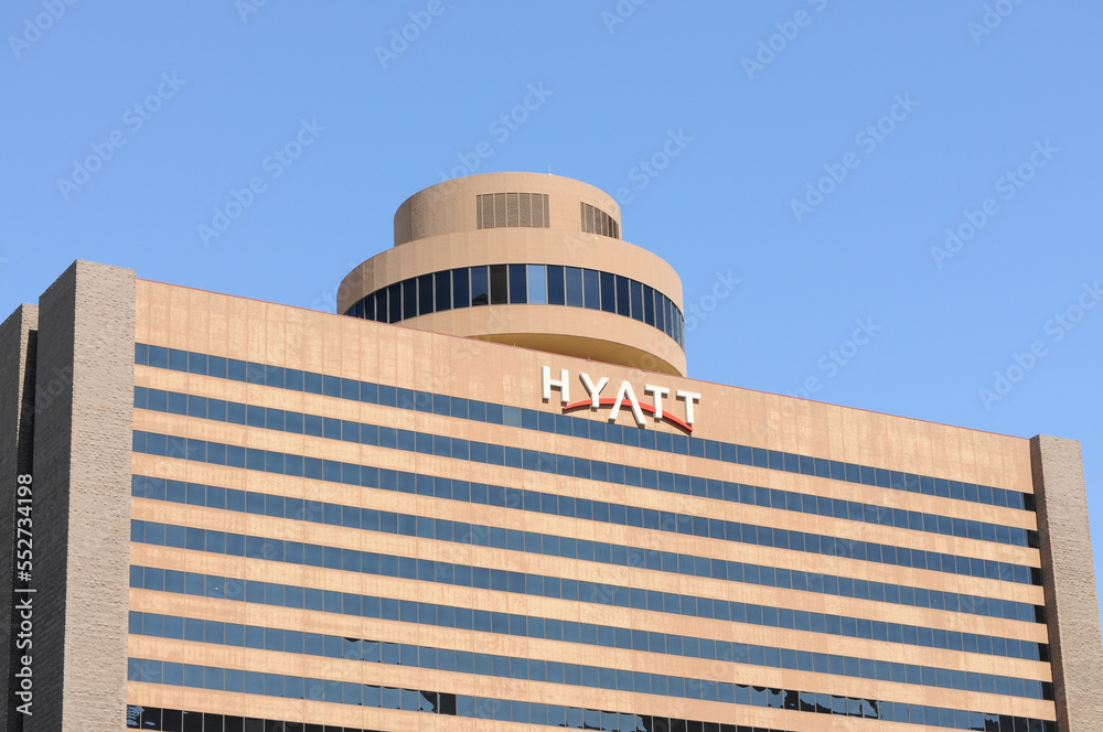 Partial front view of Hyatt Regency Convention Hotel building with sign ...