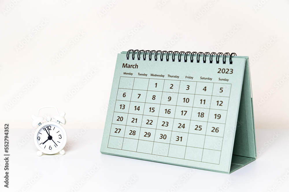 March 2023 paper calendar and little vintage clock Stock Photo | Adobe ...