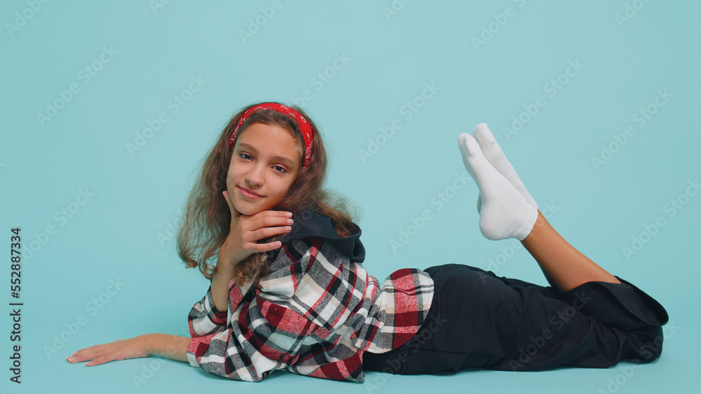 Cheerful lovely young teenager child girl kid 12 years old smiling ...