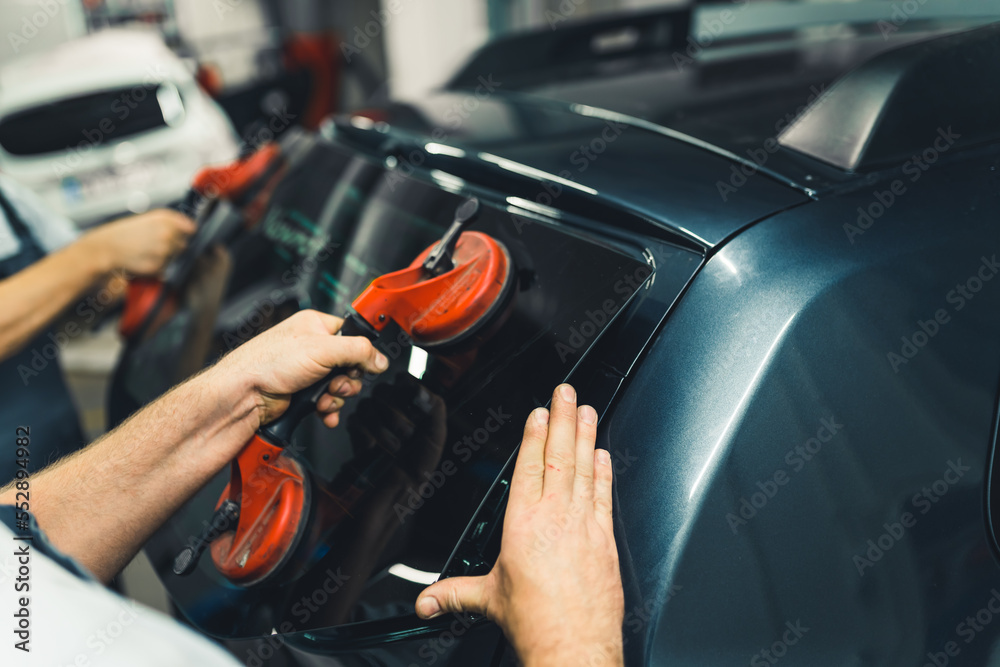 Window suction cups as necessity in windshield and rear window repair ...