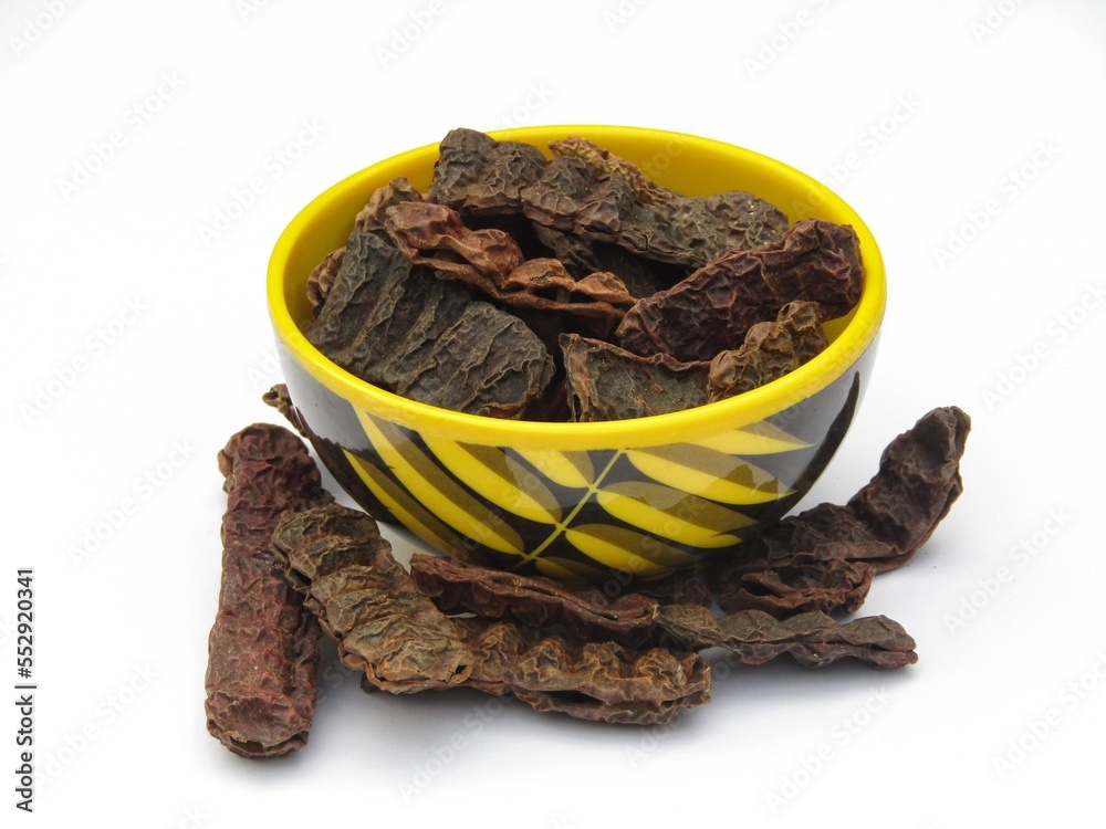 Acacia concinna or Shikakai in a bowl isolated on white background ...