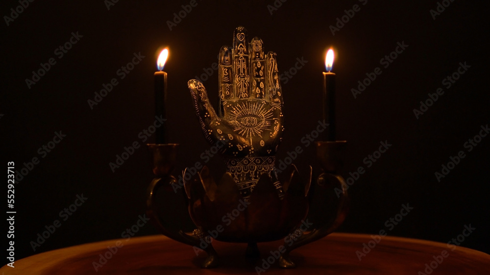 Fortune teller hand or palmistry on the witch table. Palmistry with ...
