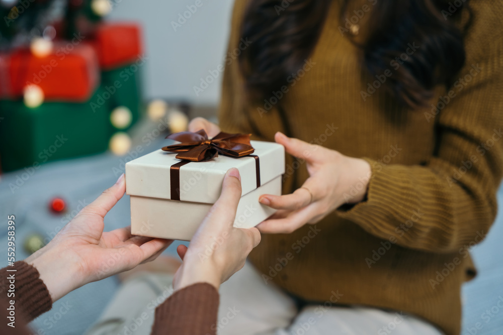 Christmas Gift in hands. Happy giving Christmas and New Year Gift box ...