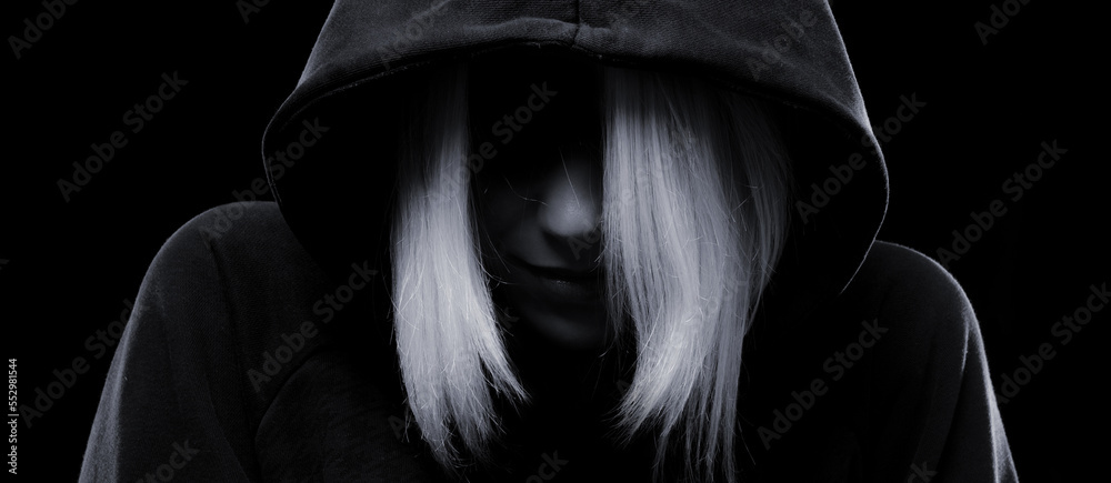 Mystery girl hiding her face under the hood Stock Photo | Adobe Stock