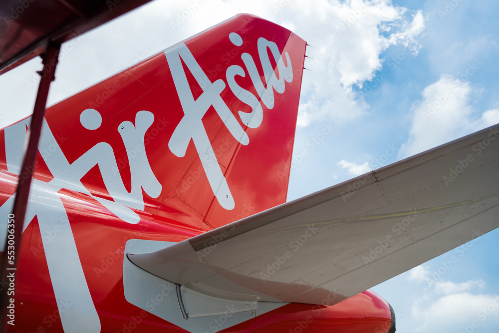 PENANG, MALAYSIA - MAY. 03, 2019: Tail of the AirAsia aircraft with ...