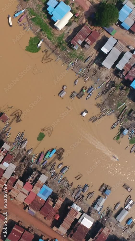 Vidéo Stock Vertical video of Drone footage of the stilt houses of ...
