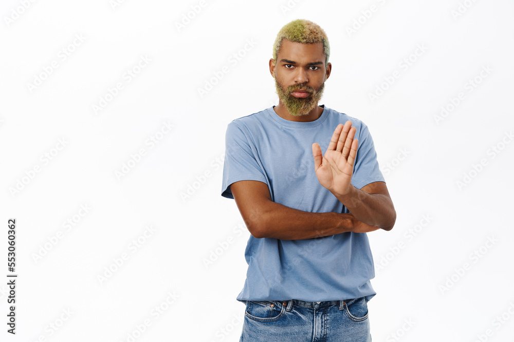 Angry Black man shows stop, enough gesture, makes palm forbid sign and ...