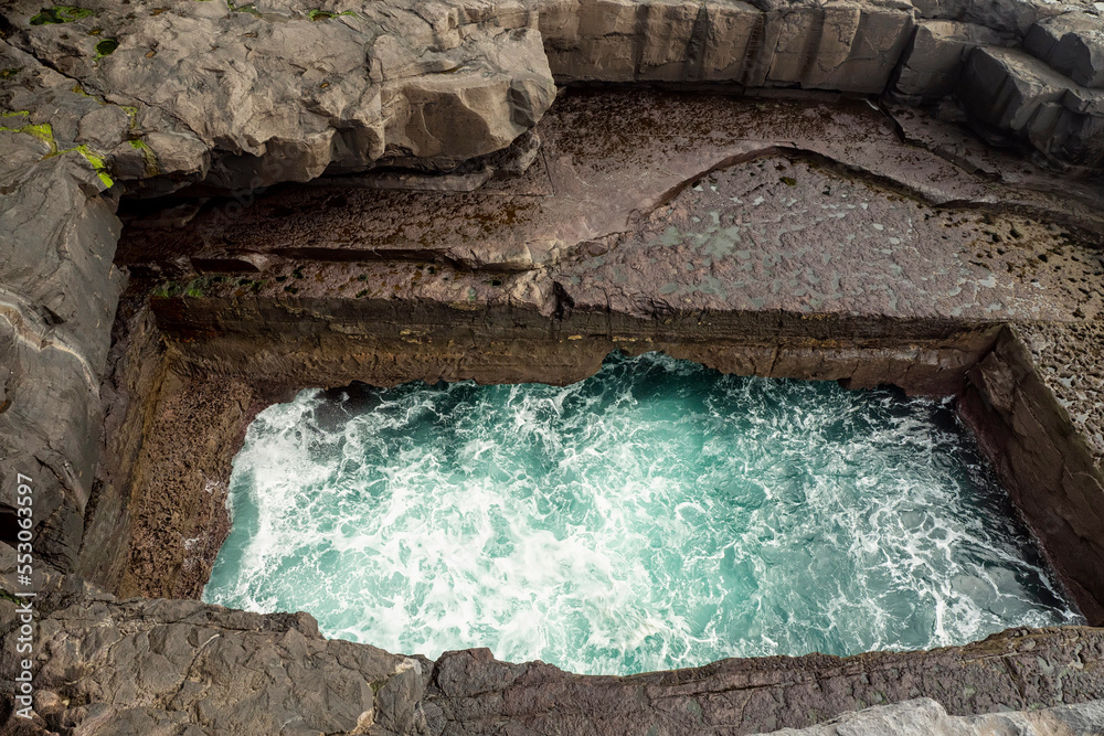View on Poll na bPéist Wormhole, Inishmore, Aran Island. Ireland ...