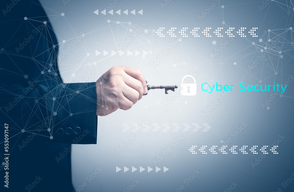 Businessman touching a key to open cyber security online safety The ...