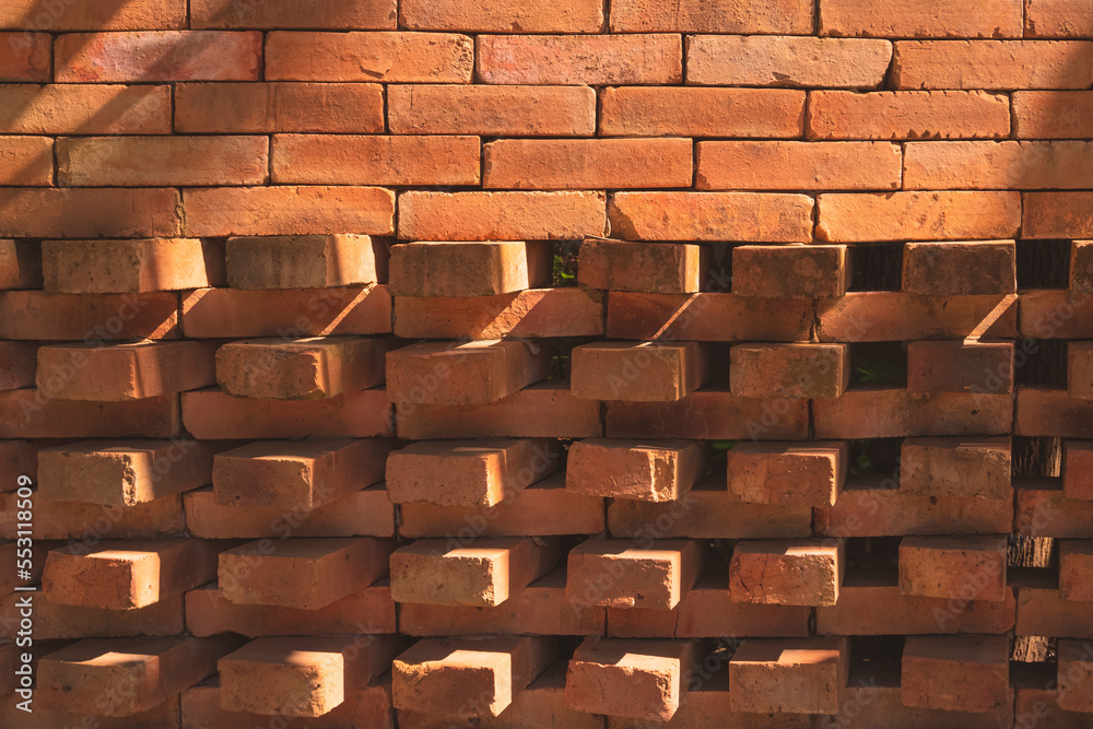 The old vintage brick wall background are arranged in alternating ...