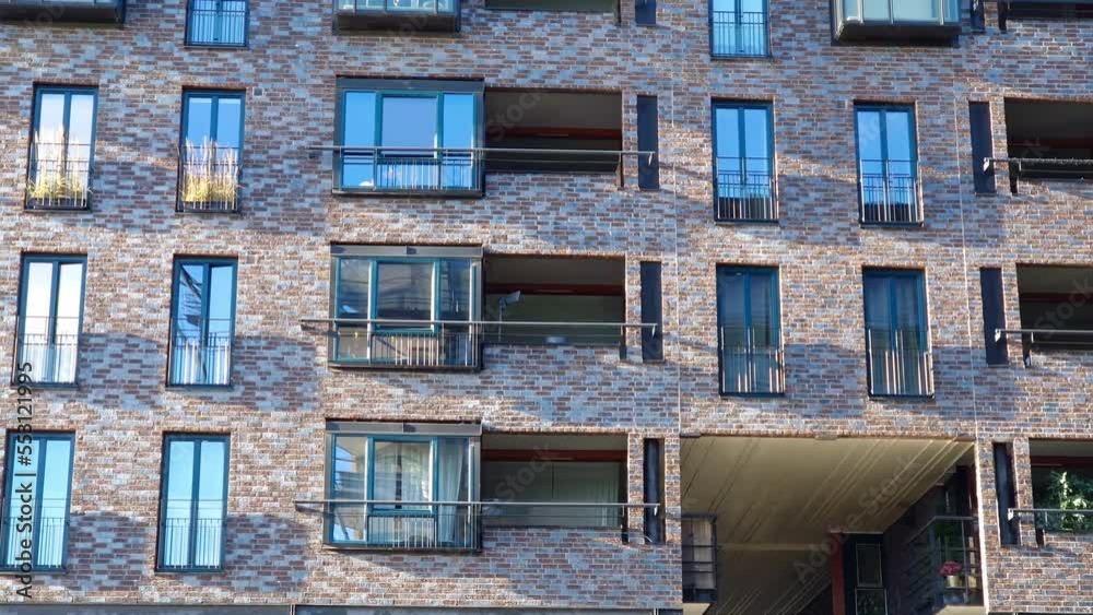 Video „Apartment building with stone cladding used as decorative facade ...