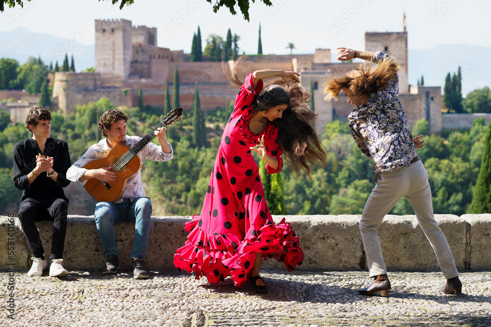Musician and dancers performing flamenco at Alhambra, Granada, Spain ...