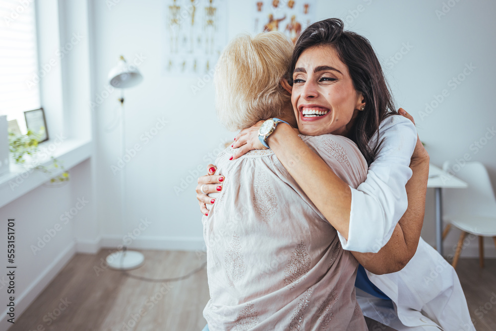 Photo & Art Print Caring young medical doctor hugging senior patient ...