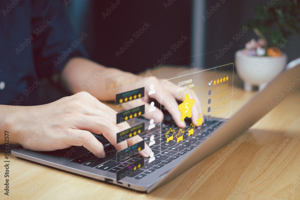 Men use laptop computers to rate services. with realistic five-star ...